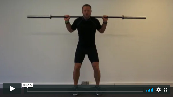 Deep squat with bar (shown with heel lift) - Recover Gym